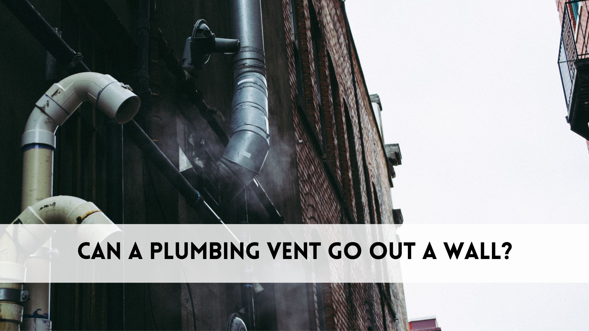 Can a plumbing vent go out a wall?